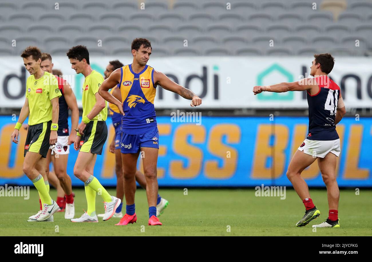 Brendon Ah Chee of the Eagles and Jay Lockhart of the Demons react at ...