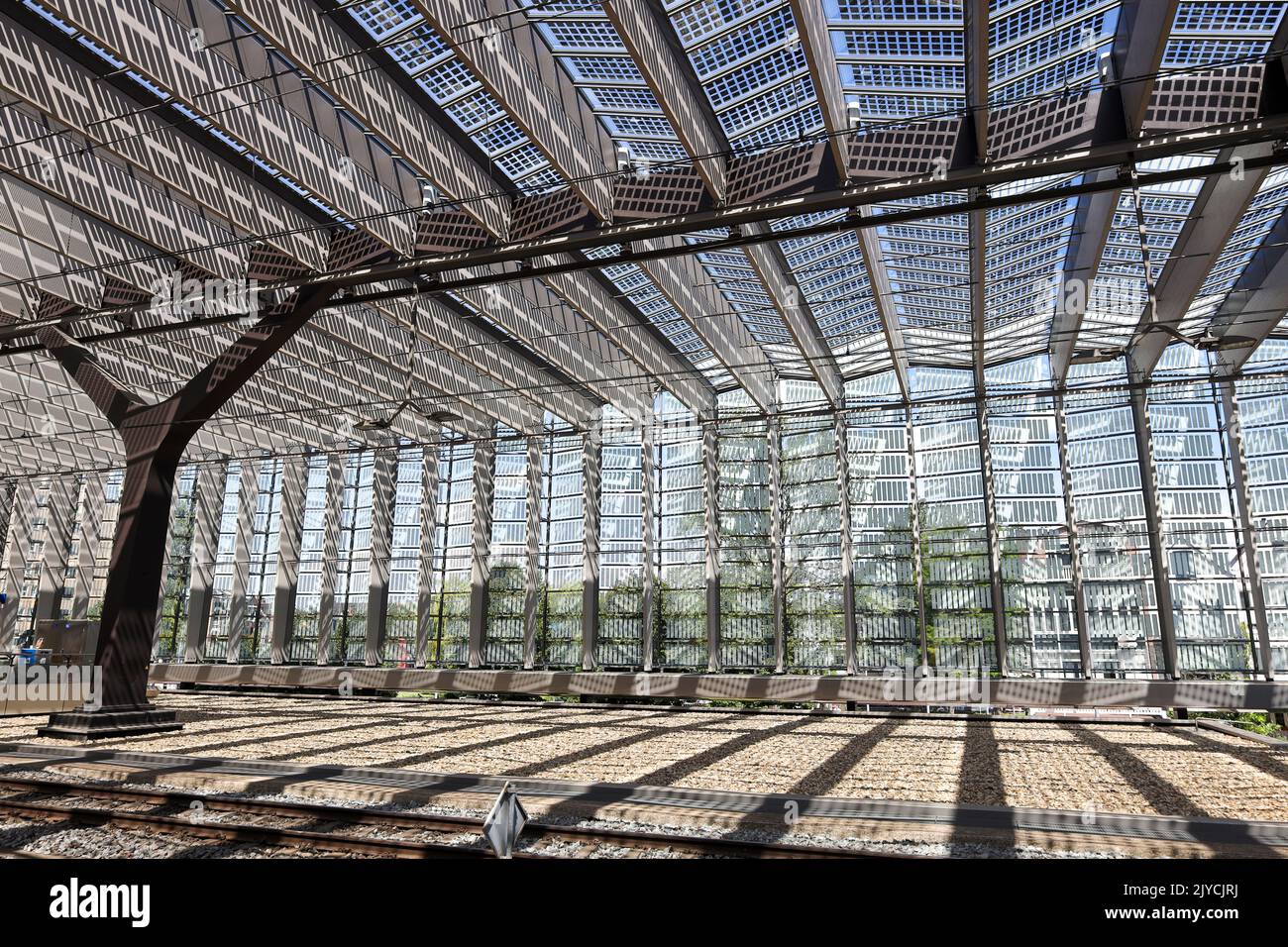 Walls and roof of glass of the modern Rotterdam Central Station in the ...
