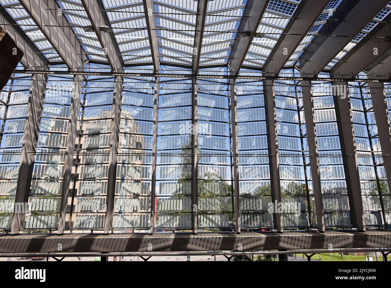 Walls and roof of glass of the modern Rotterdam Central Station in the ...