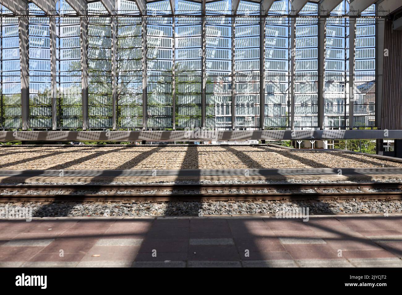 Walls and roof of glass of the modern Rotterdam Central Station in the ...