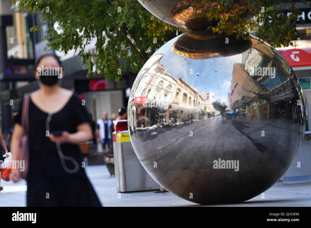 People are seen walking through Rundle Mall in Adelaide, Saturday ...