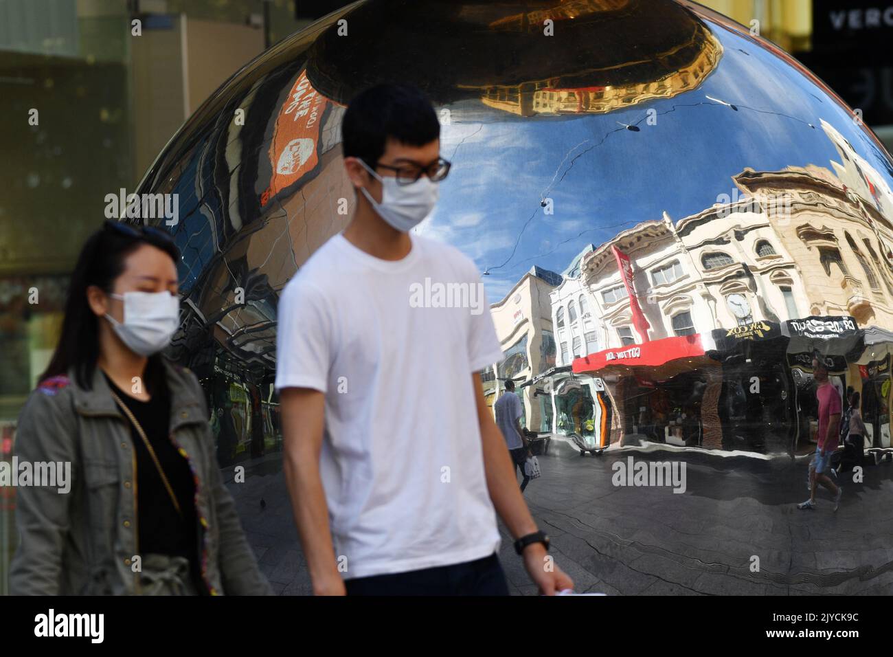 People are seen walking through Rundle Mall in Adelaide, Saturday ...