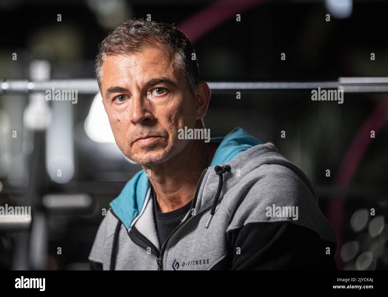 Paul Gill poses for a portrait in his gym, G-Fitness Rhodes, which has ...