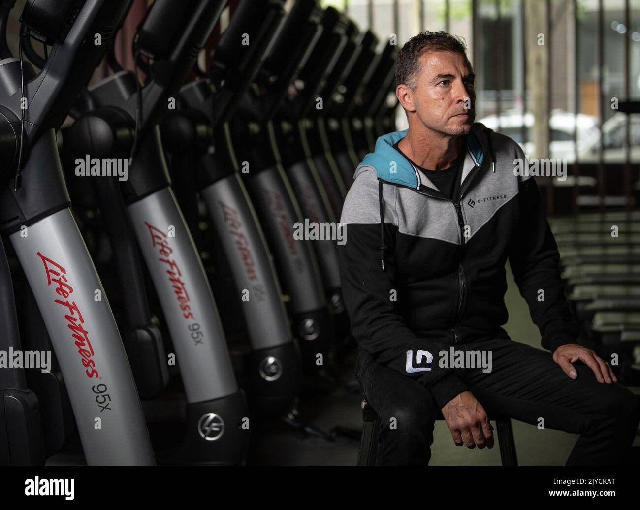 Paul Gill poses for a portrait in his gym, G-Fitness Rhodes, which has ...