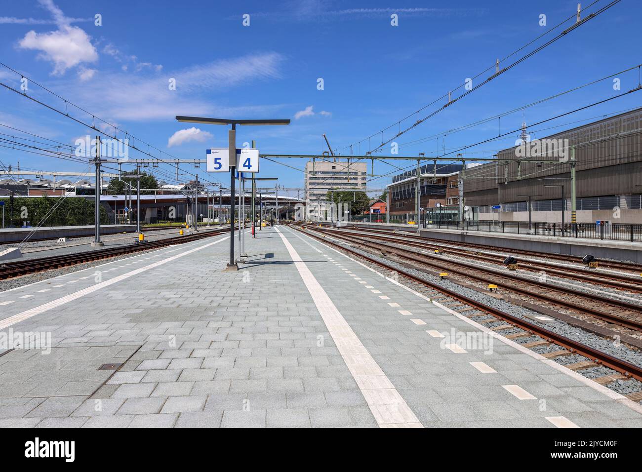 Platforms and railroad tracks at the railway station of Zwolle in the ...