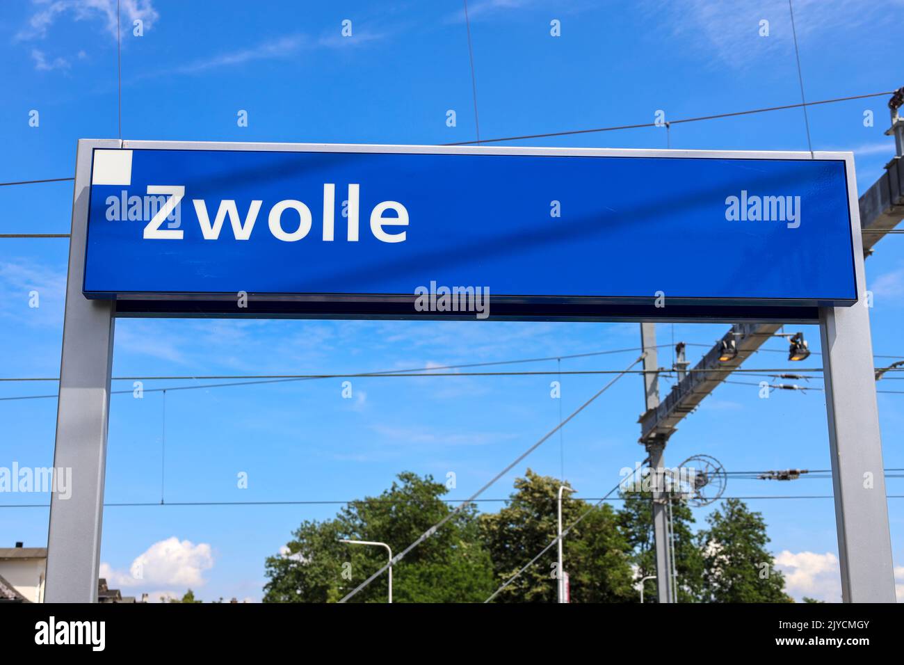 Blue and white name sign at the platform of Zwolle station in the ...