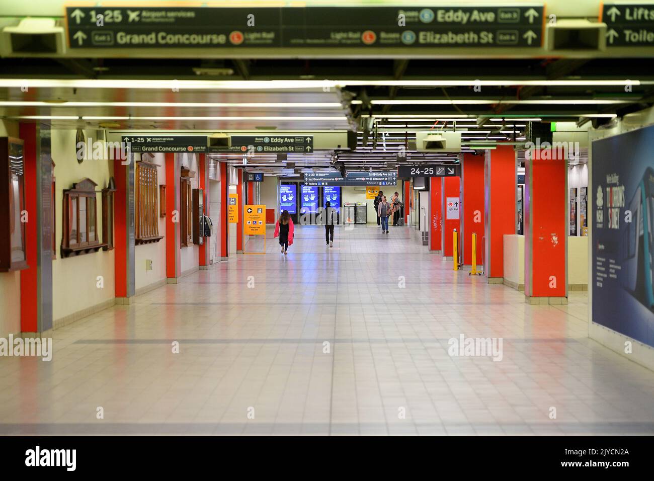 Commuters are seen on an almost empty concourse at Central Station in ...