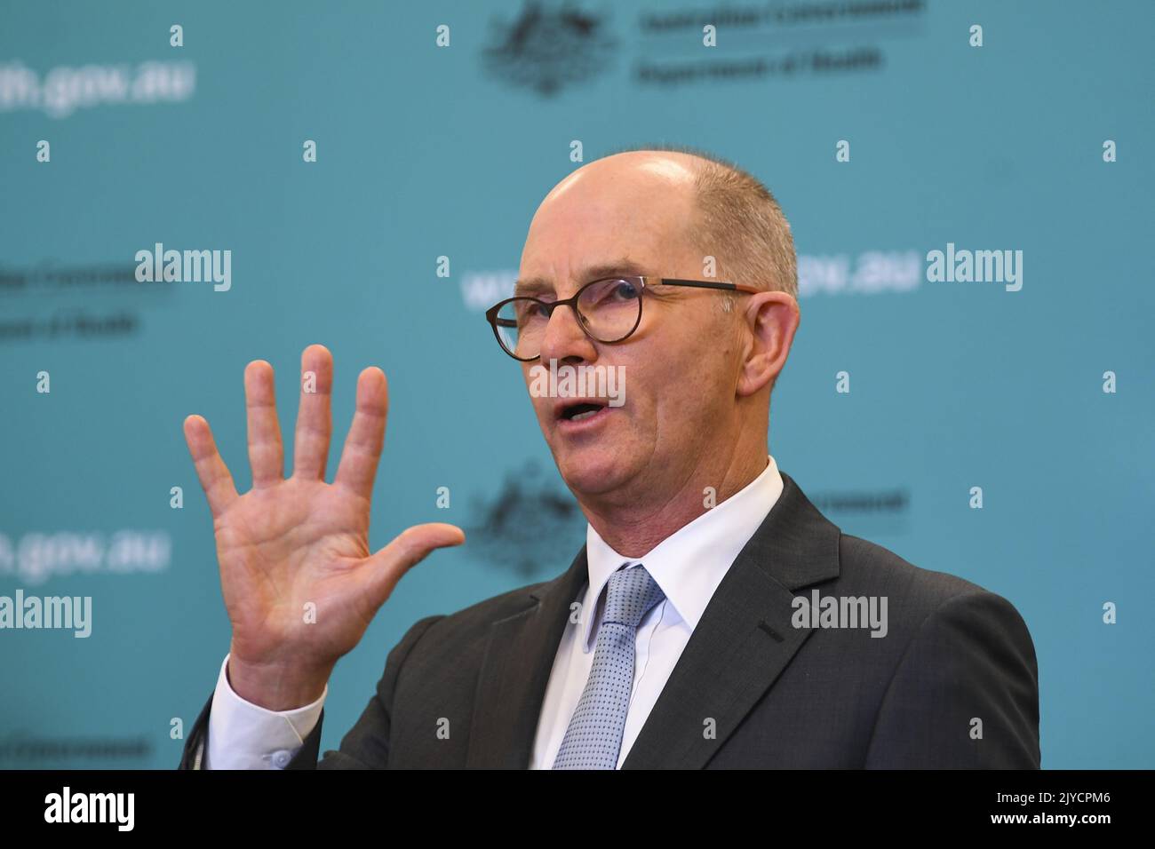 Deputy Chief Medical Officer Professor Paul Kelly speaks to the media ...
