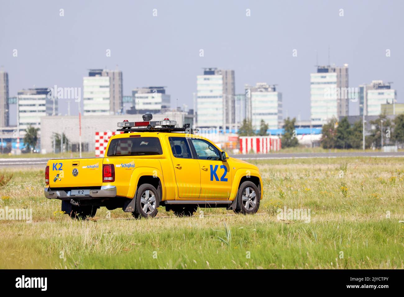 K2 bird watch vehicle besides Aalsmeerbaan Runway on Amsterdam Schiphol ...