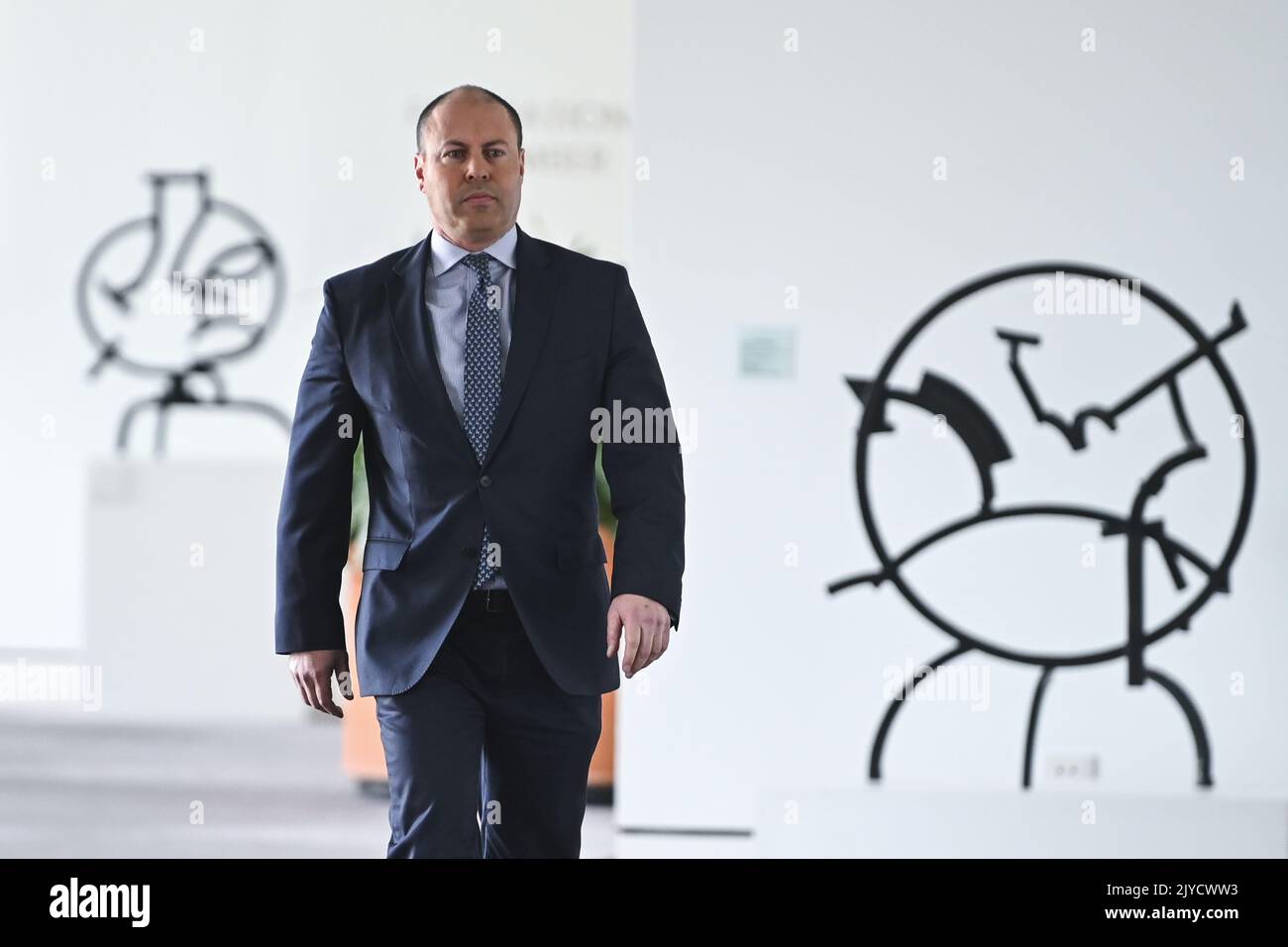 Australian Treasurer Josh Frydenberg arrives to speak to the media ...