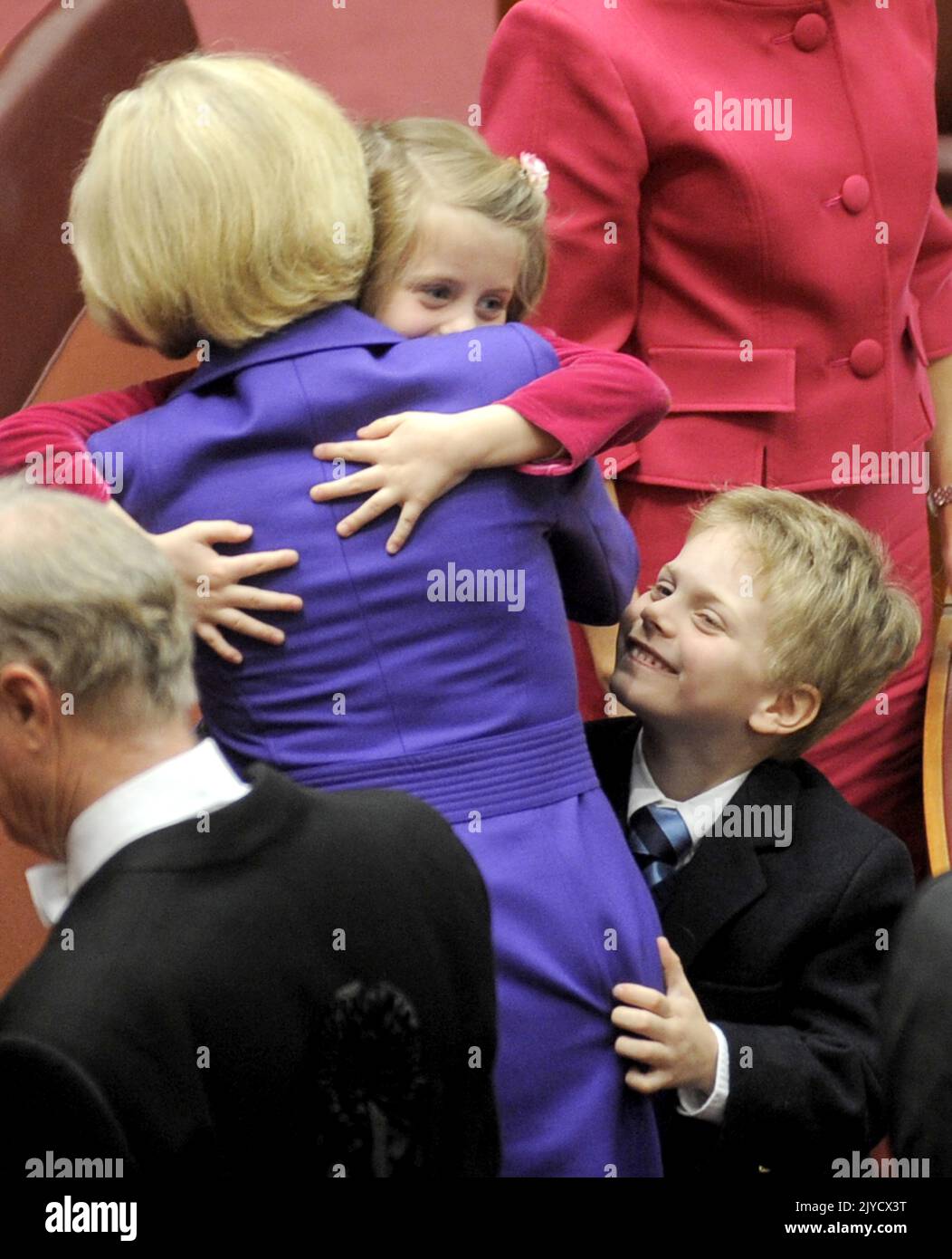 Quentin Bryce hugs her grandchildren Georgette Parkin (top) and Rupert ...