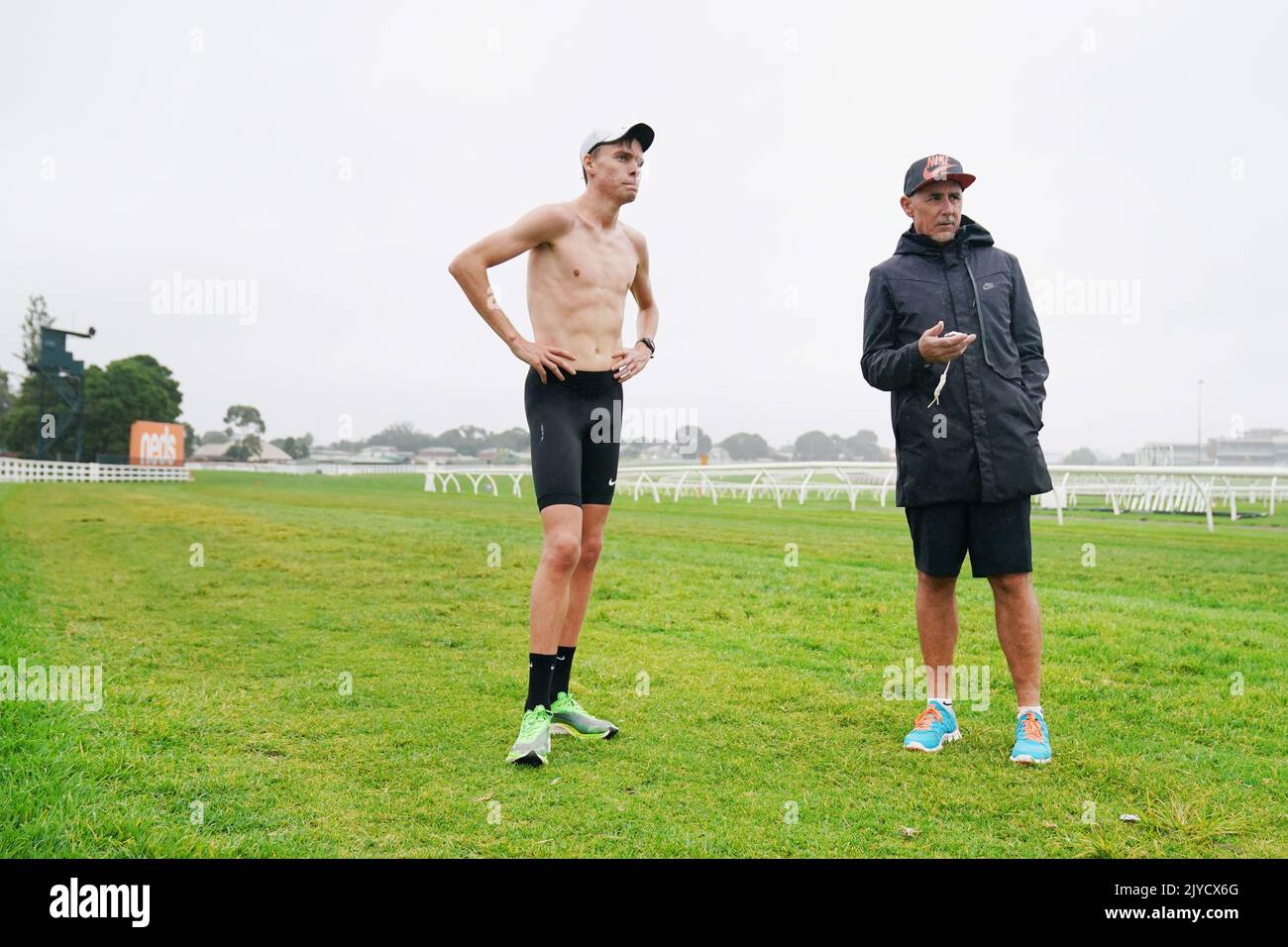 Olympic bound athlete Stewart McSweyn talks to coach Nic Bideau after a ...