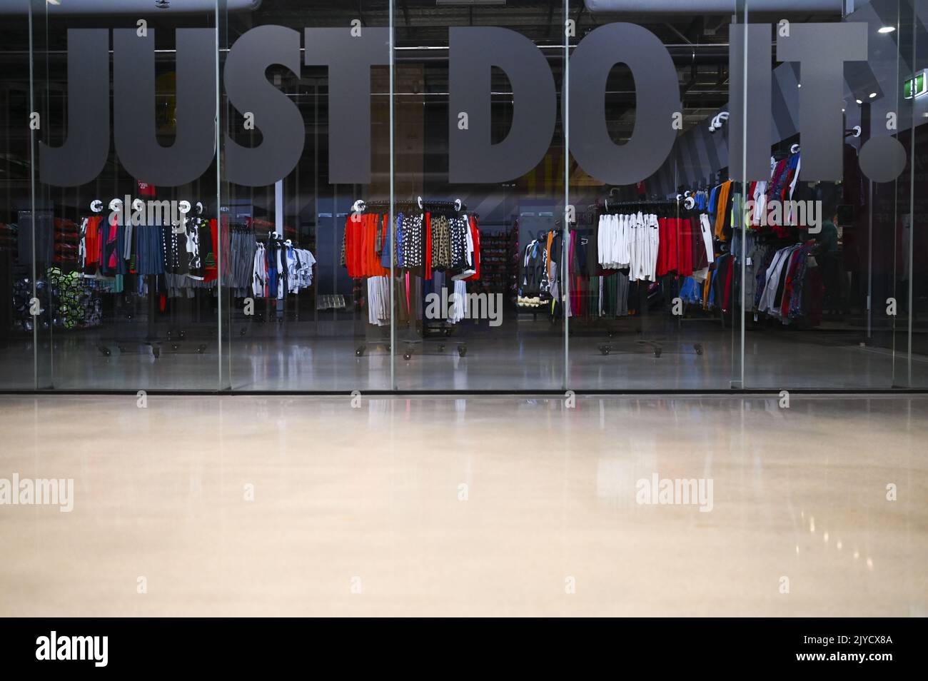 A closed shop front is seen inside an Outlet Shopping Centre in ...