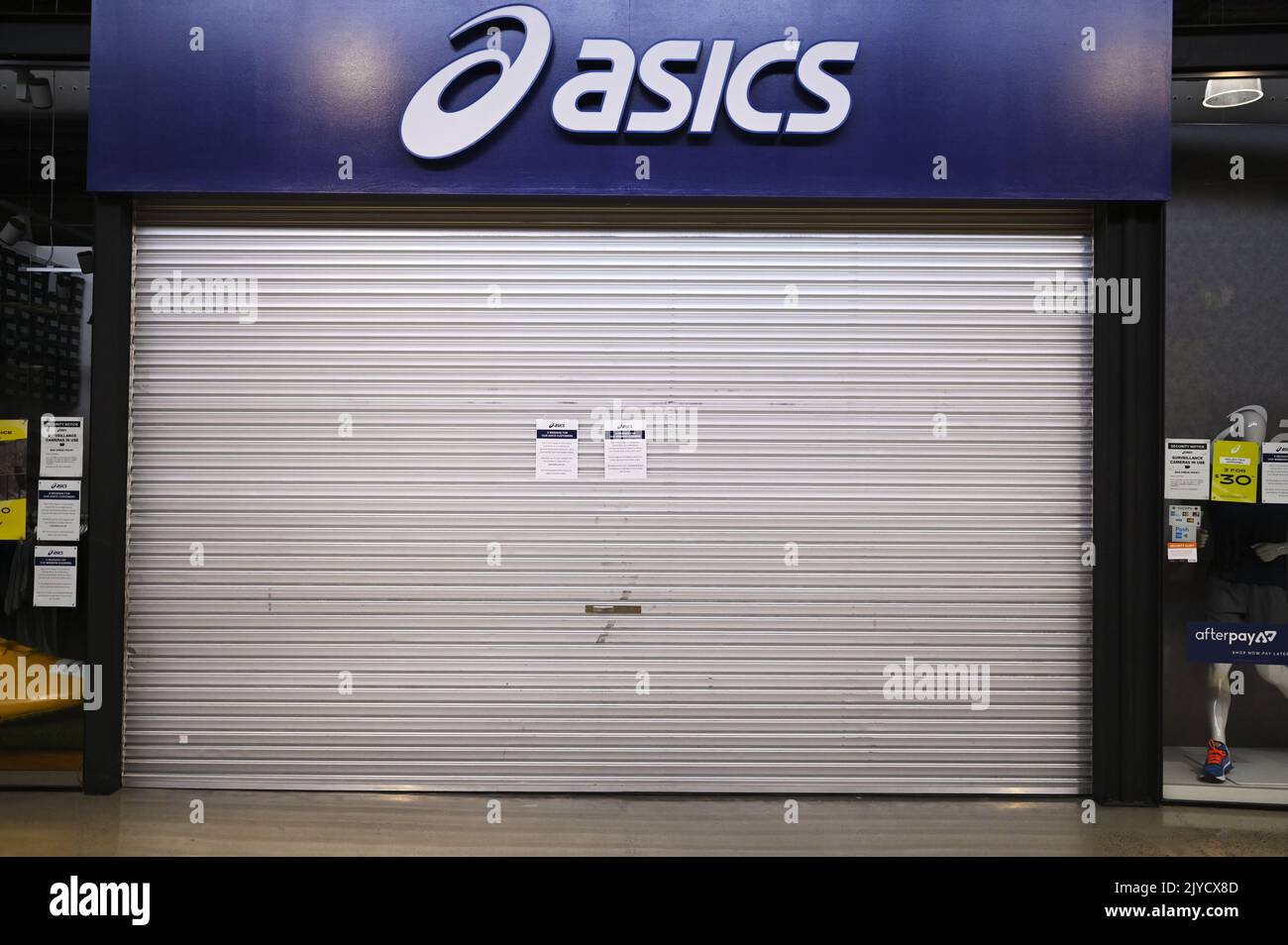 A closed shop front is seen inside an Outlet Shopping Centre in ...