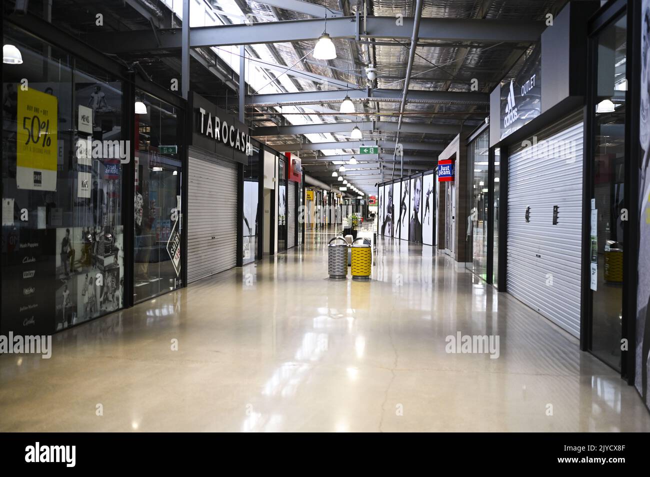 Closed shop fronts are seen inside an Outlet Shopping Centre in ...