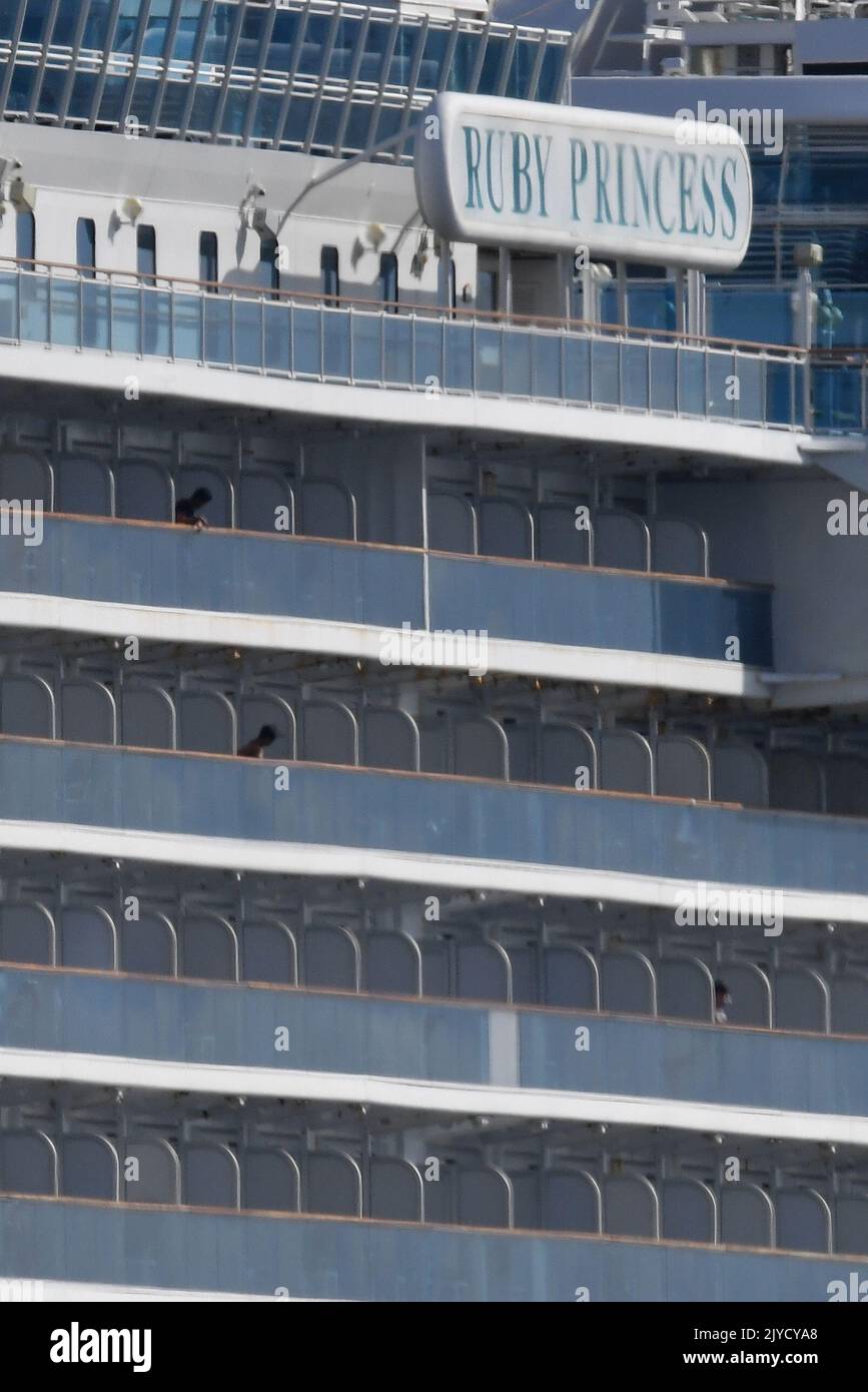 Crew can be seen on the Ruby Princess cruise which remains docked at ...