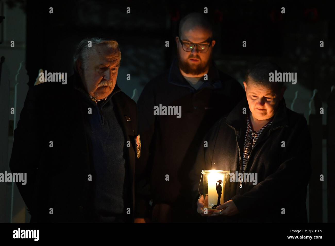(L-R) Vietnam veteran Rod Coote, son Nathan and wife Julie observe a ...