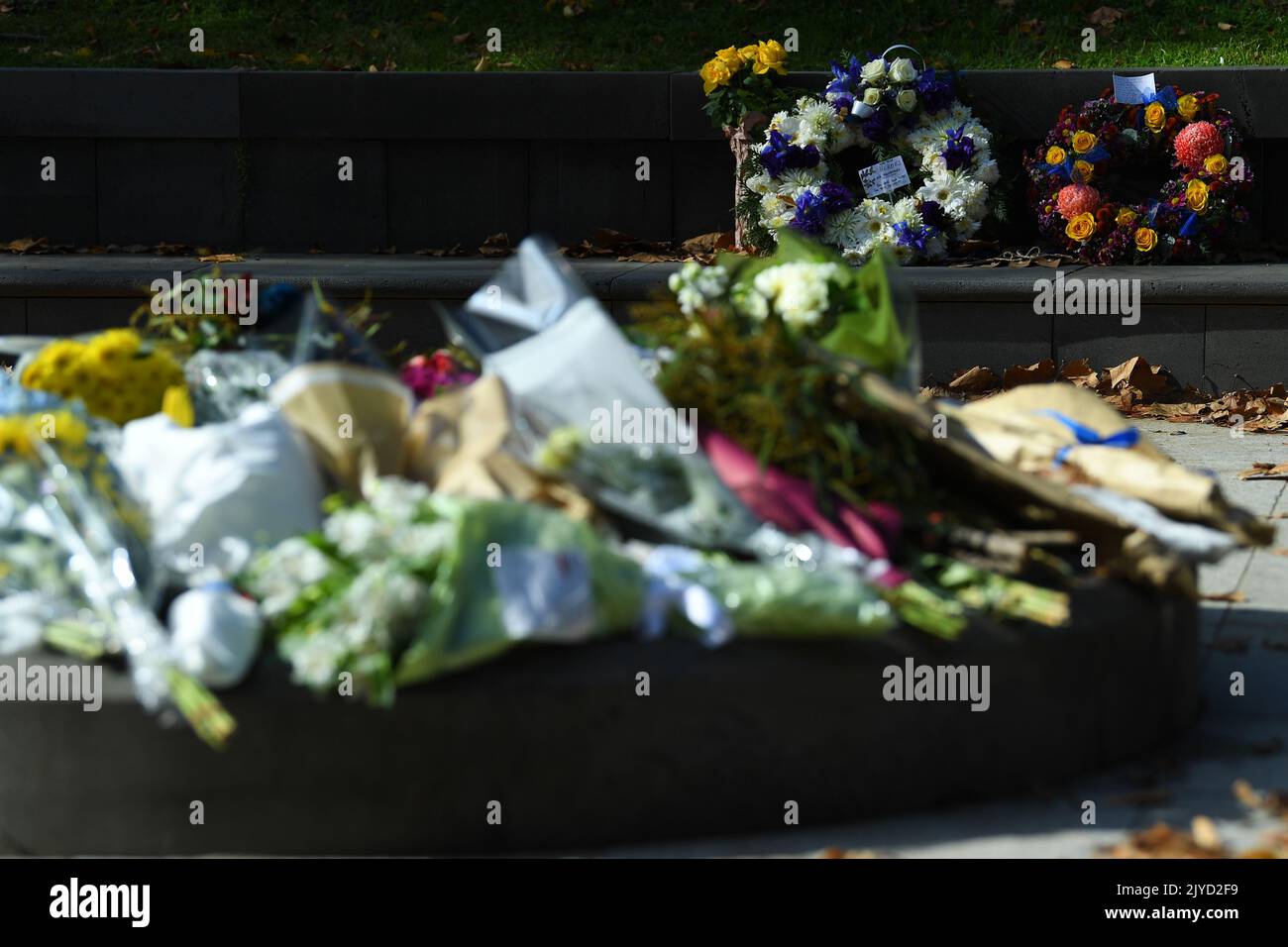 Flowers are seen at the Victoria Police Memorial in Melbourne, Monday ...