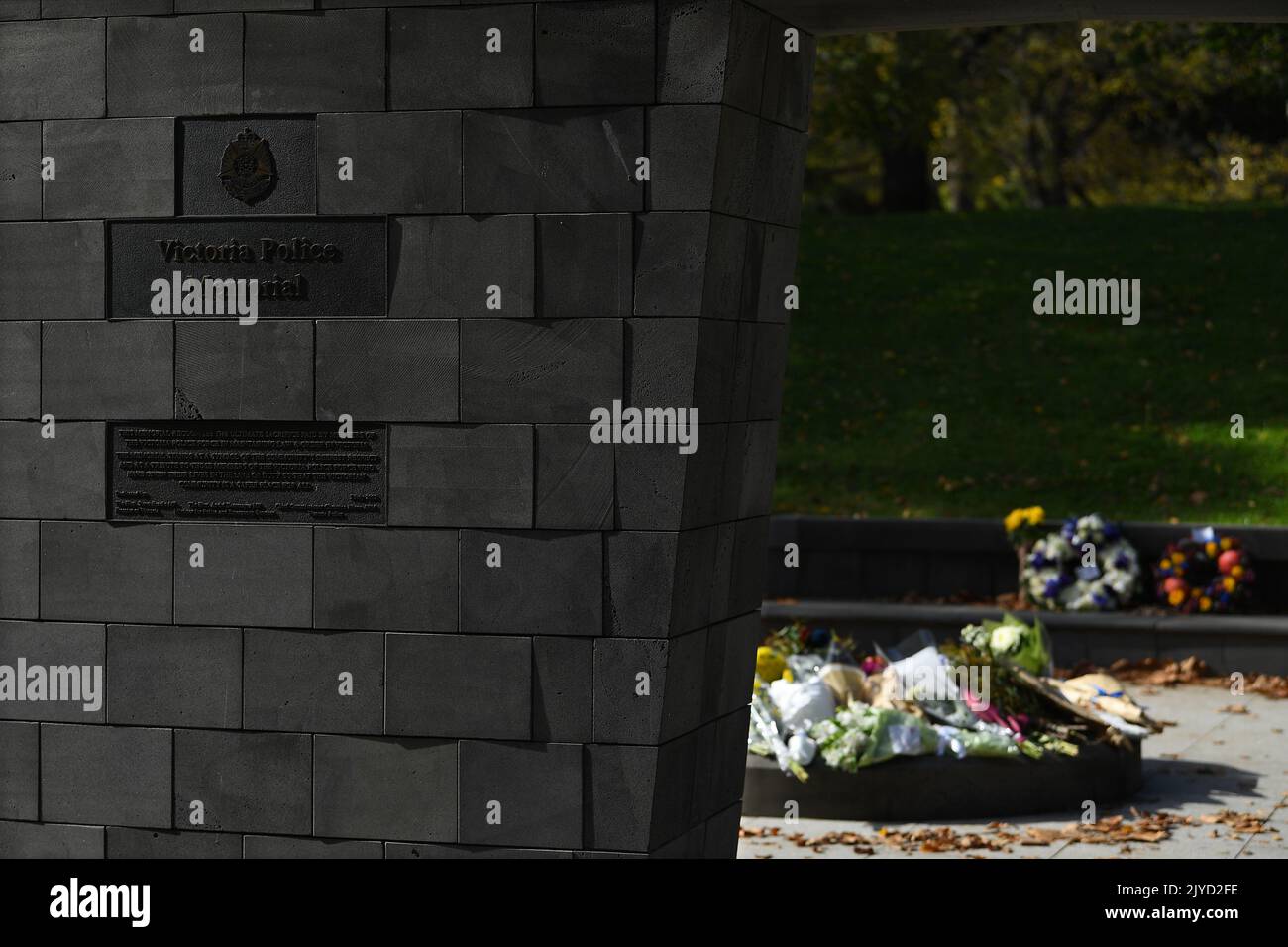 Flowers are seen at the Victoria Police Memorial in Melbourne, Monday ...