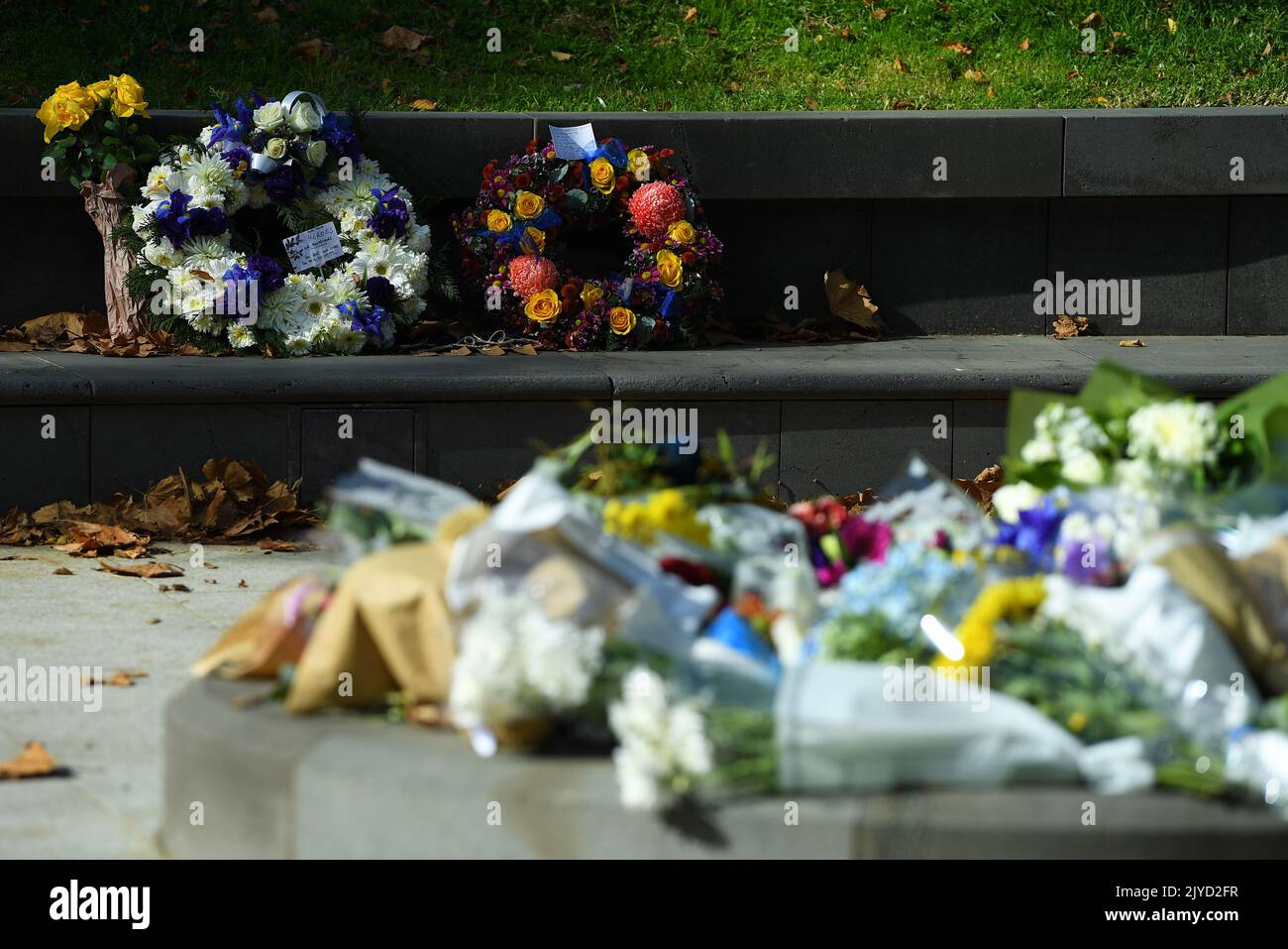 Flowers are seen at the Victoria Police Memorial in Melbourne, Monday ...