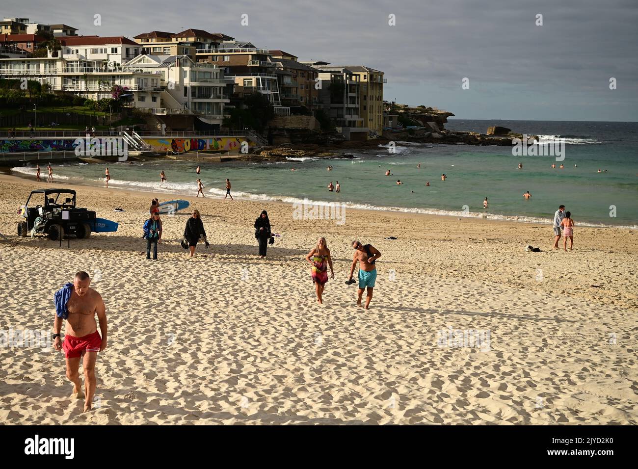 Swimmers leave the water as Bondi Beach reopens to the public after ...