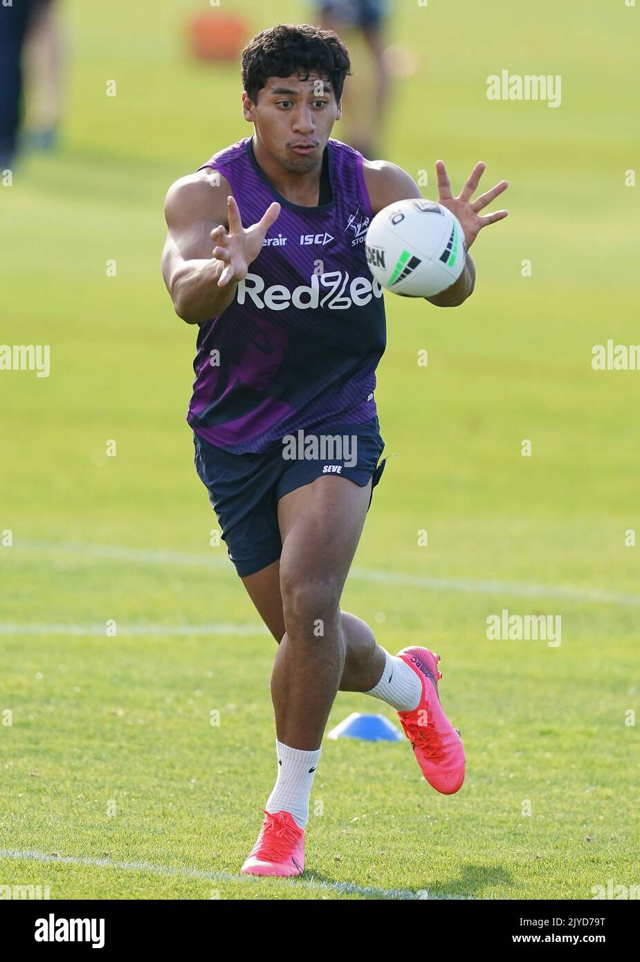 Marion Seve runs with the ball during a Melbourne Storm NRL training ...