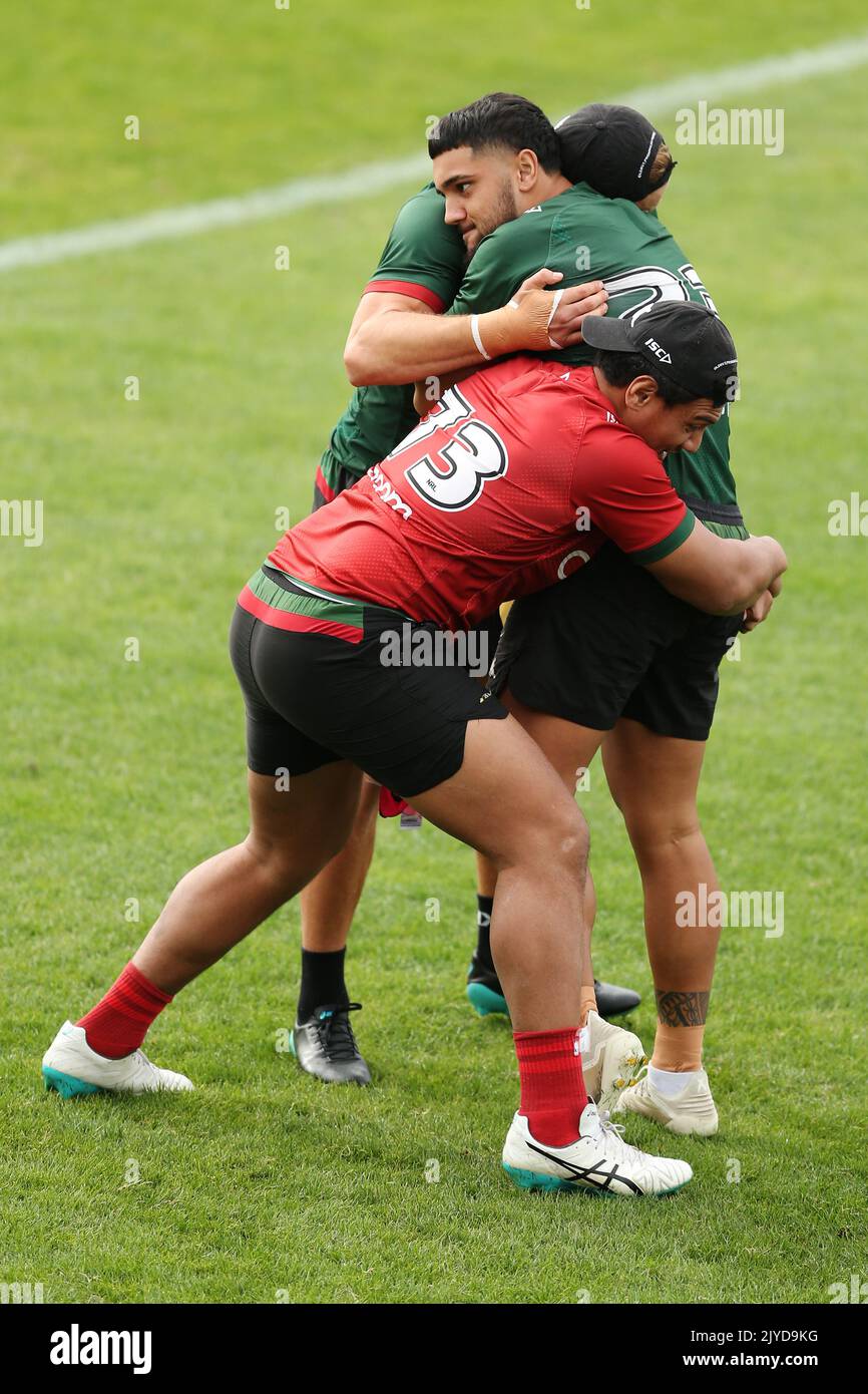 Keaon Koloamatangi of the Rabbitohs grapples with team mates during an ...