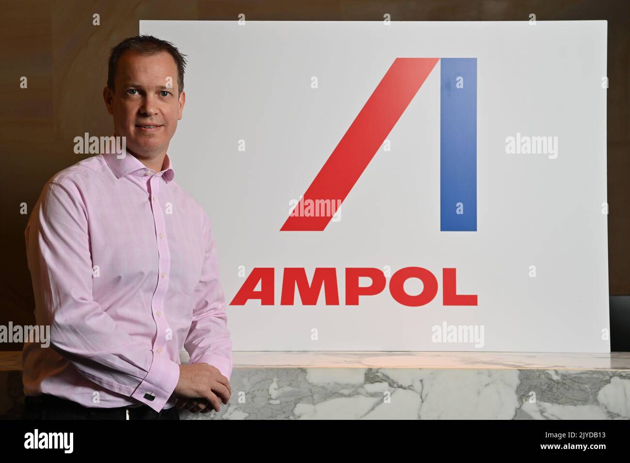 Caltex Interim CEO Matthew Halliday poses for a photograph with the new ...