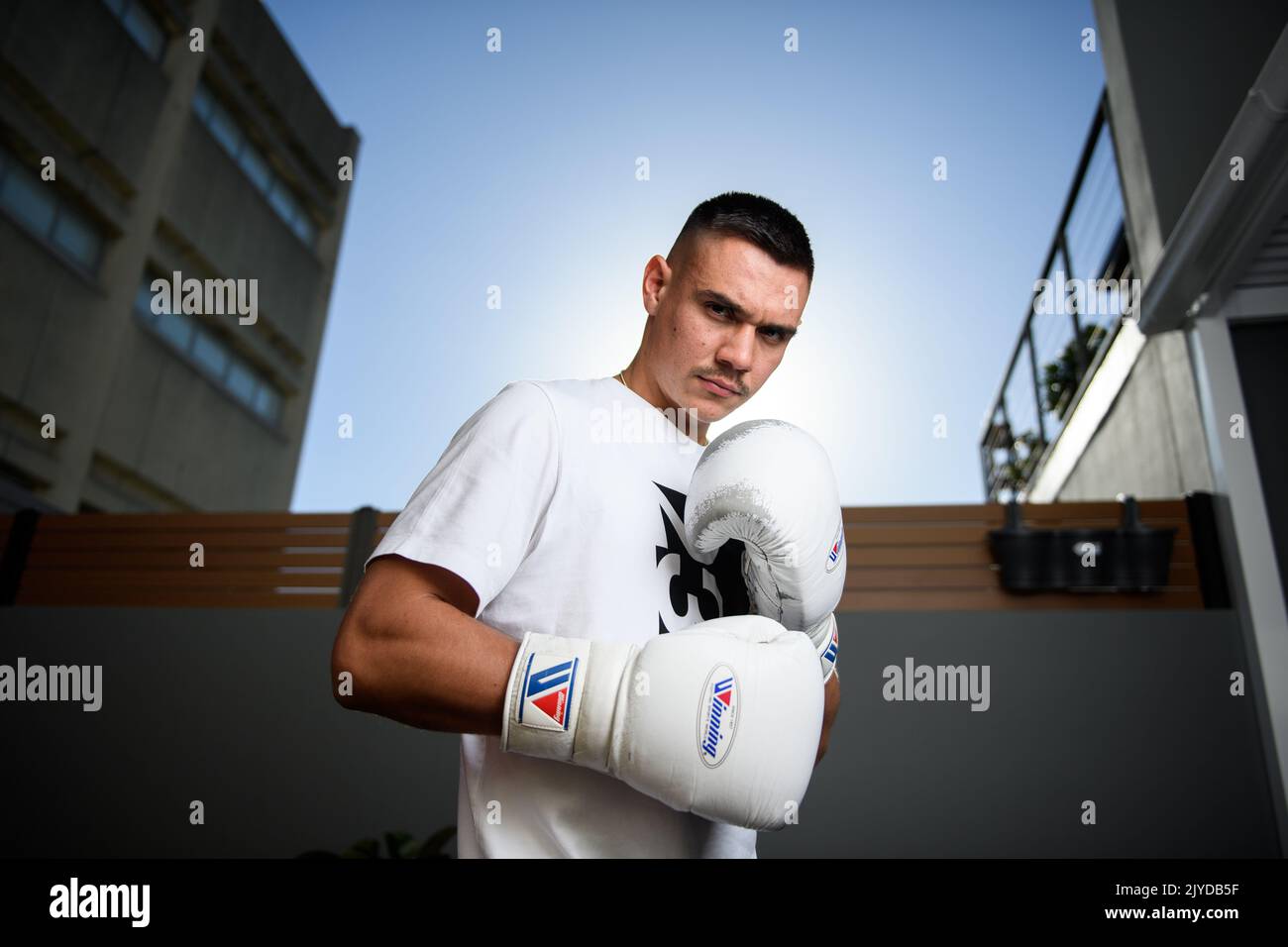 Australian boxer Tim Tszyu poses for photographs at his family home in ...