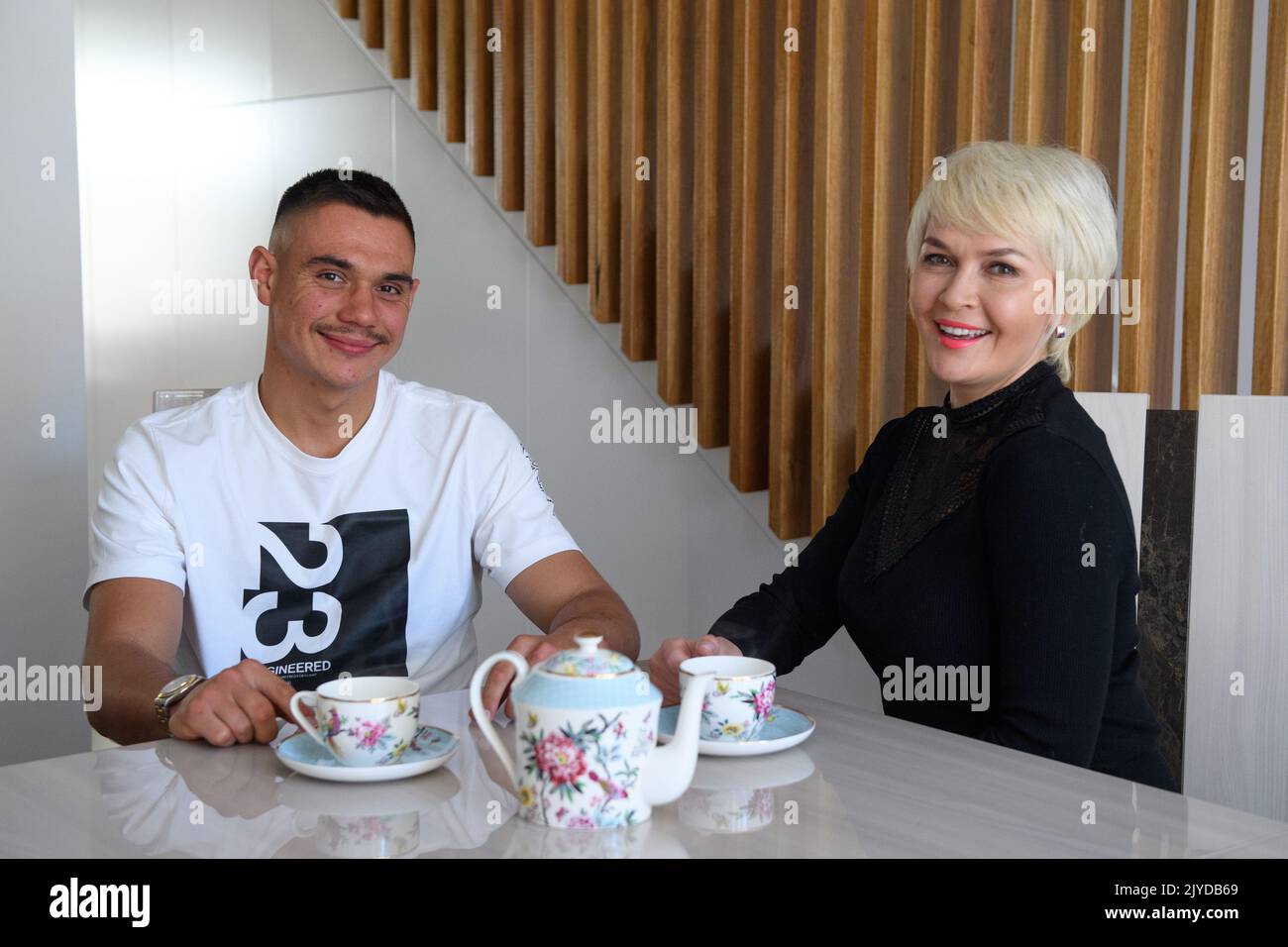 Australian boxer Tim Tszyu and his mother Natasha pose for photographs ...