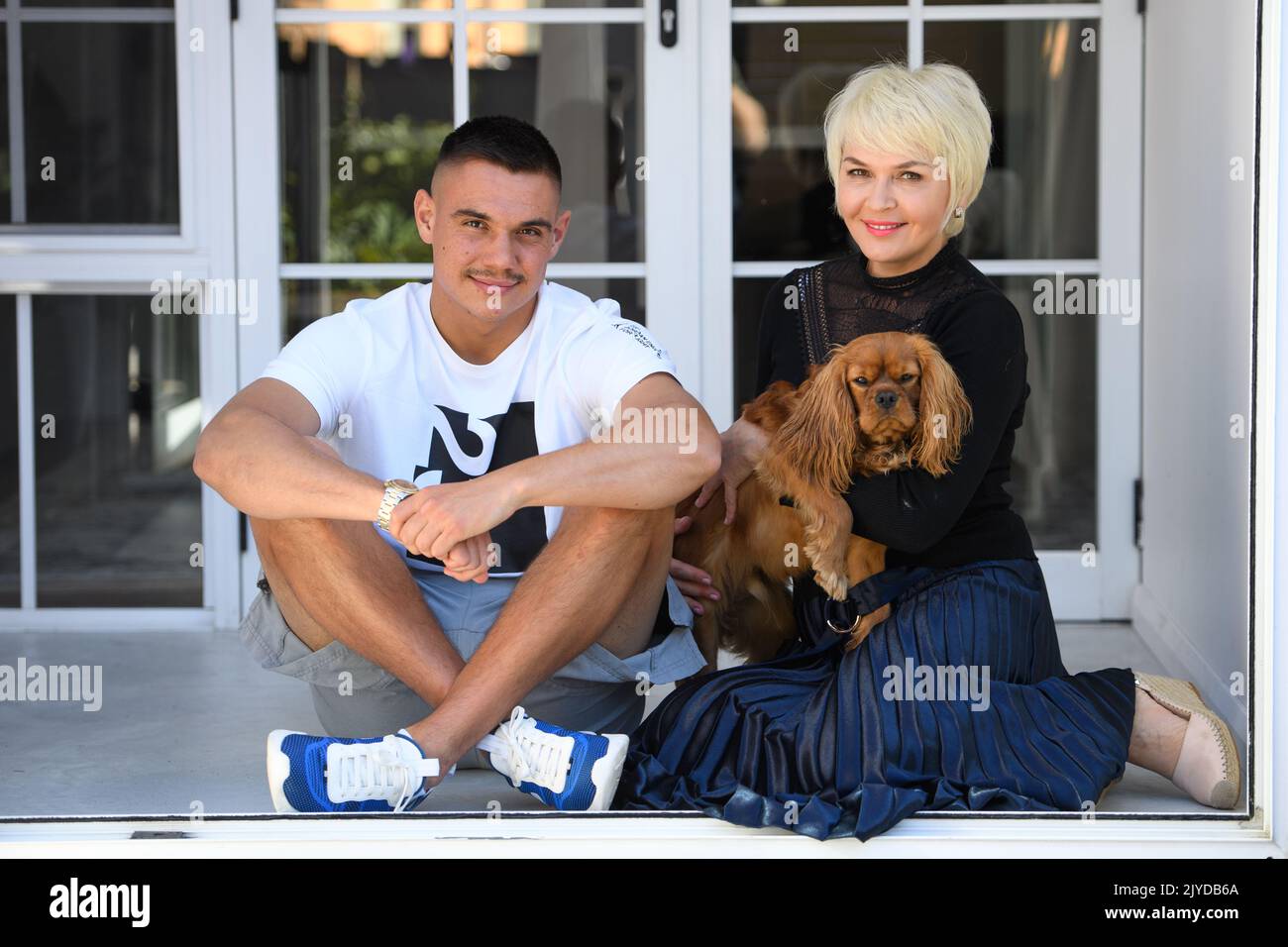 Australian boxer Tim Tszyu and his mother Natasha pose for photographs ...