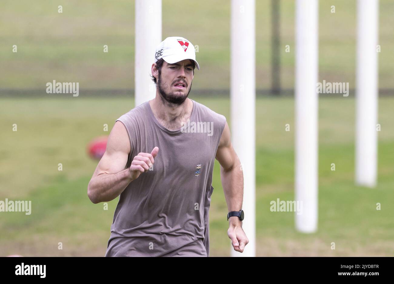 Tom Mccartin of the Sydney Swans trains in the Grounds opposite the SCG ...