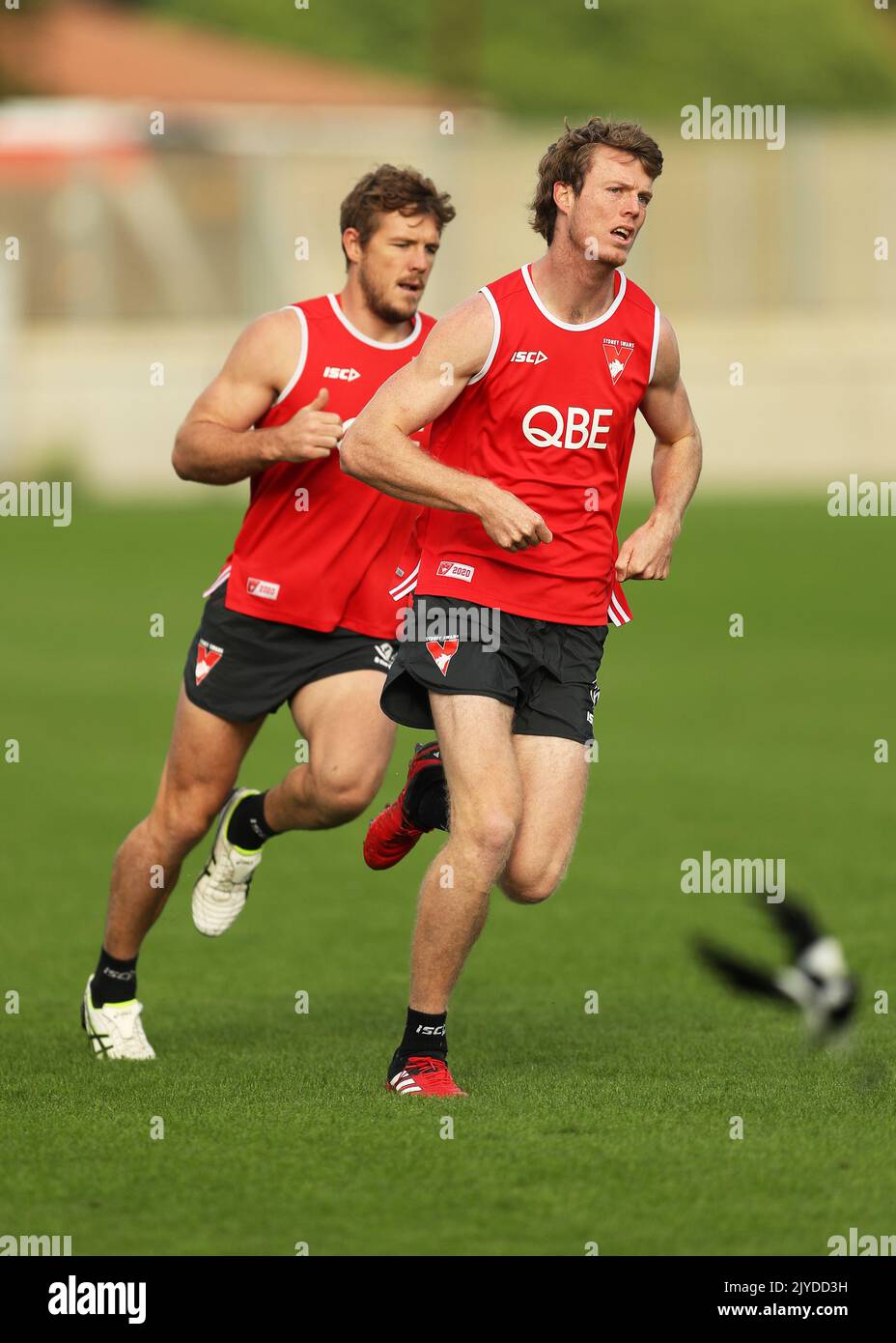 Nick Blakey and Luke Parker of the Swans run during a Sydney Swan ...