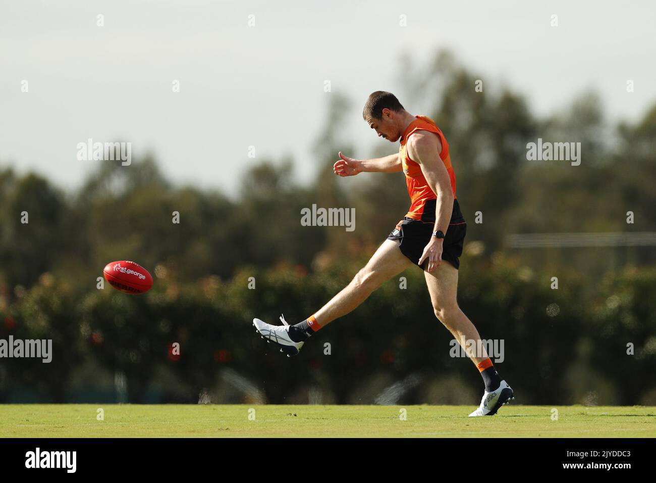 Jeremy Cameron of the Giants kicks during a GWS Giants training session ...