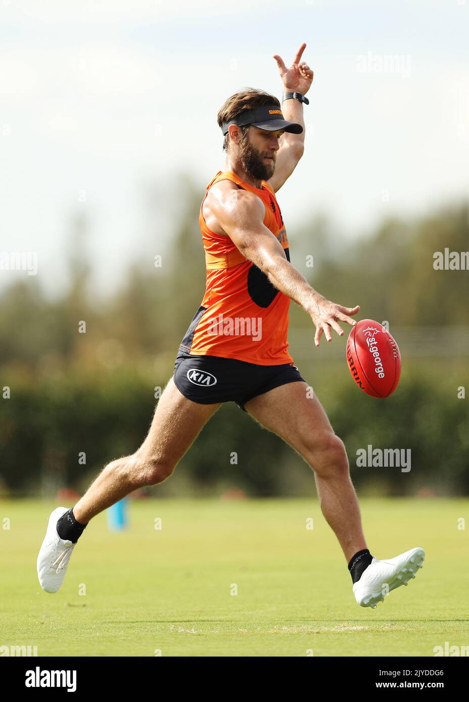 Matt De Boer of the Giants kicks during a GWS Giants training session at Giants HQ in Sydney ...