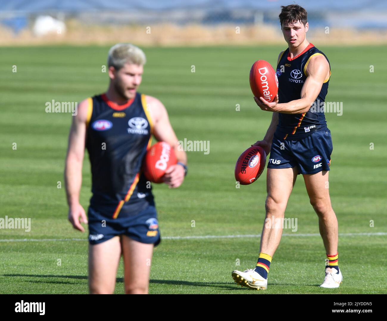 Luke Brown of the Crows (R) is seen during a training session at West ...