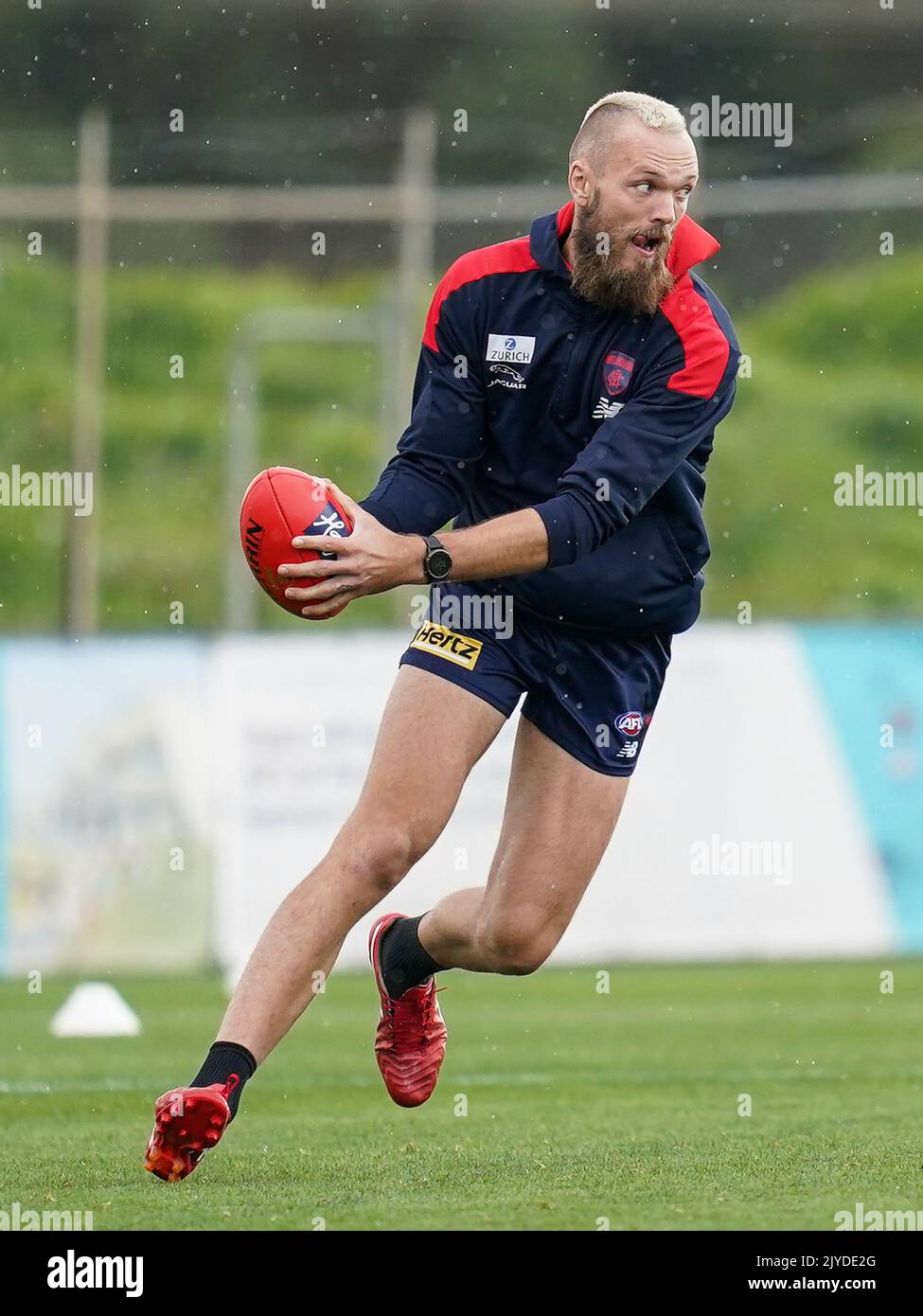 Max Gawn of the Demons runs with the ball during an AFL Demons training ...