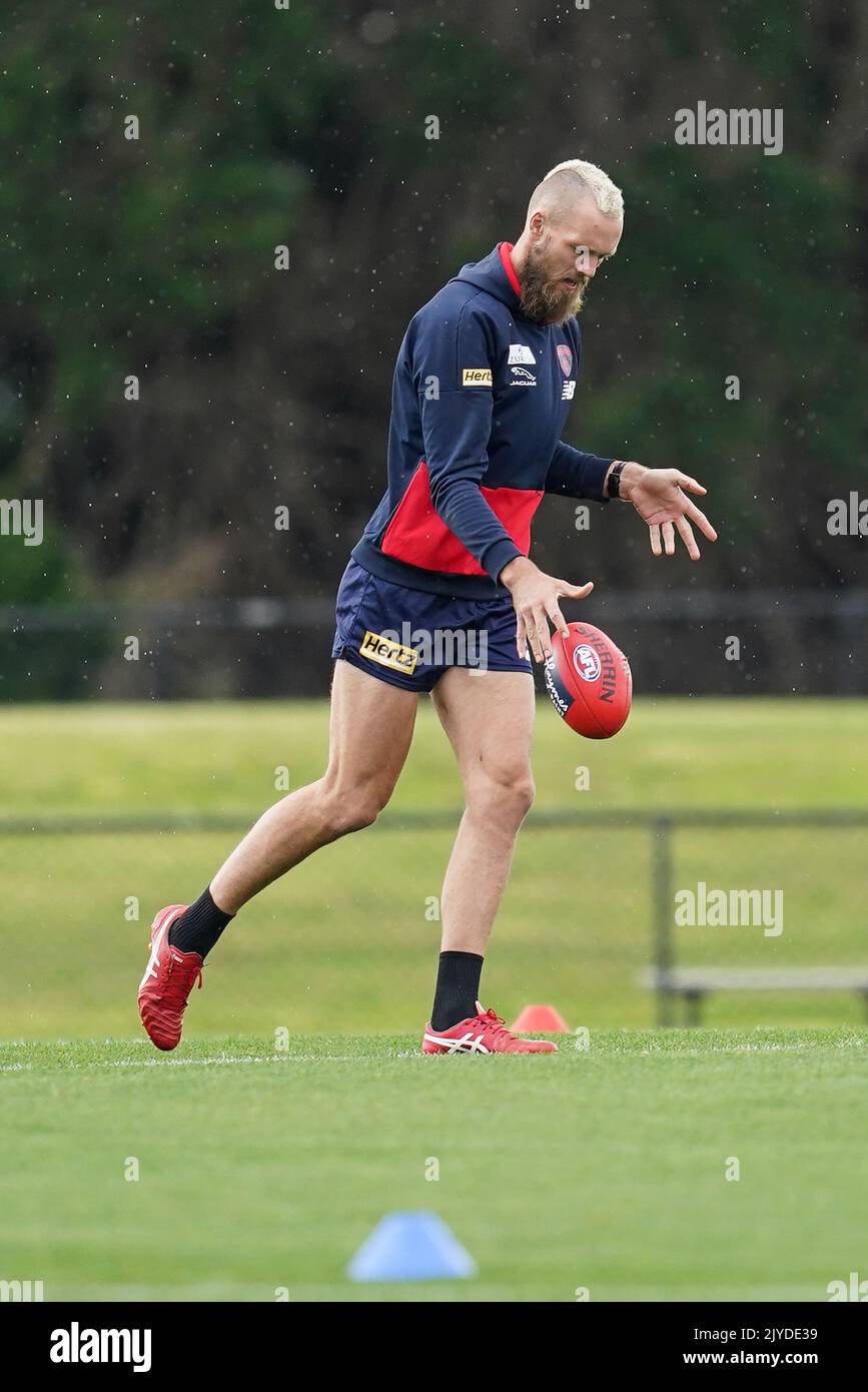 Max Gawn of the Demons kicks the ball during an AFL Demons training ...