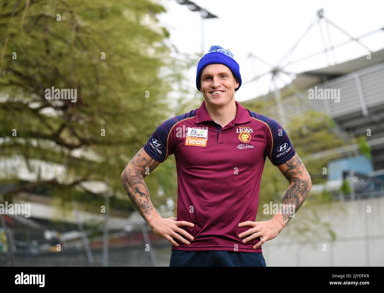 Brisbane Lions player Mitch Robinson poses for photos before a press ...