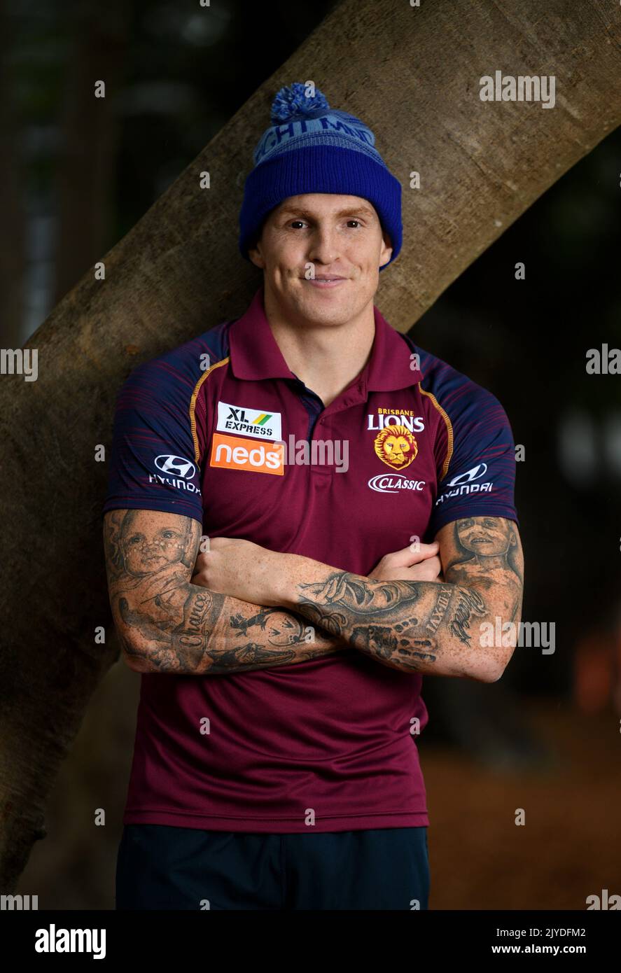Brisbane Lions player Mitch Robinson poses for photos before a press ...