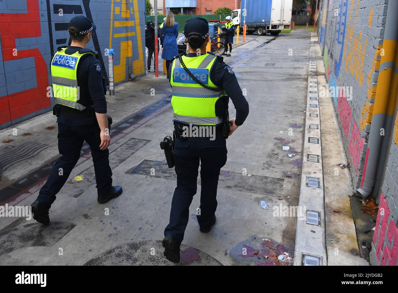 Victoria Police officers patrol near Victoria Street in Richmond ...