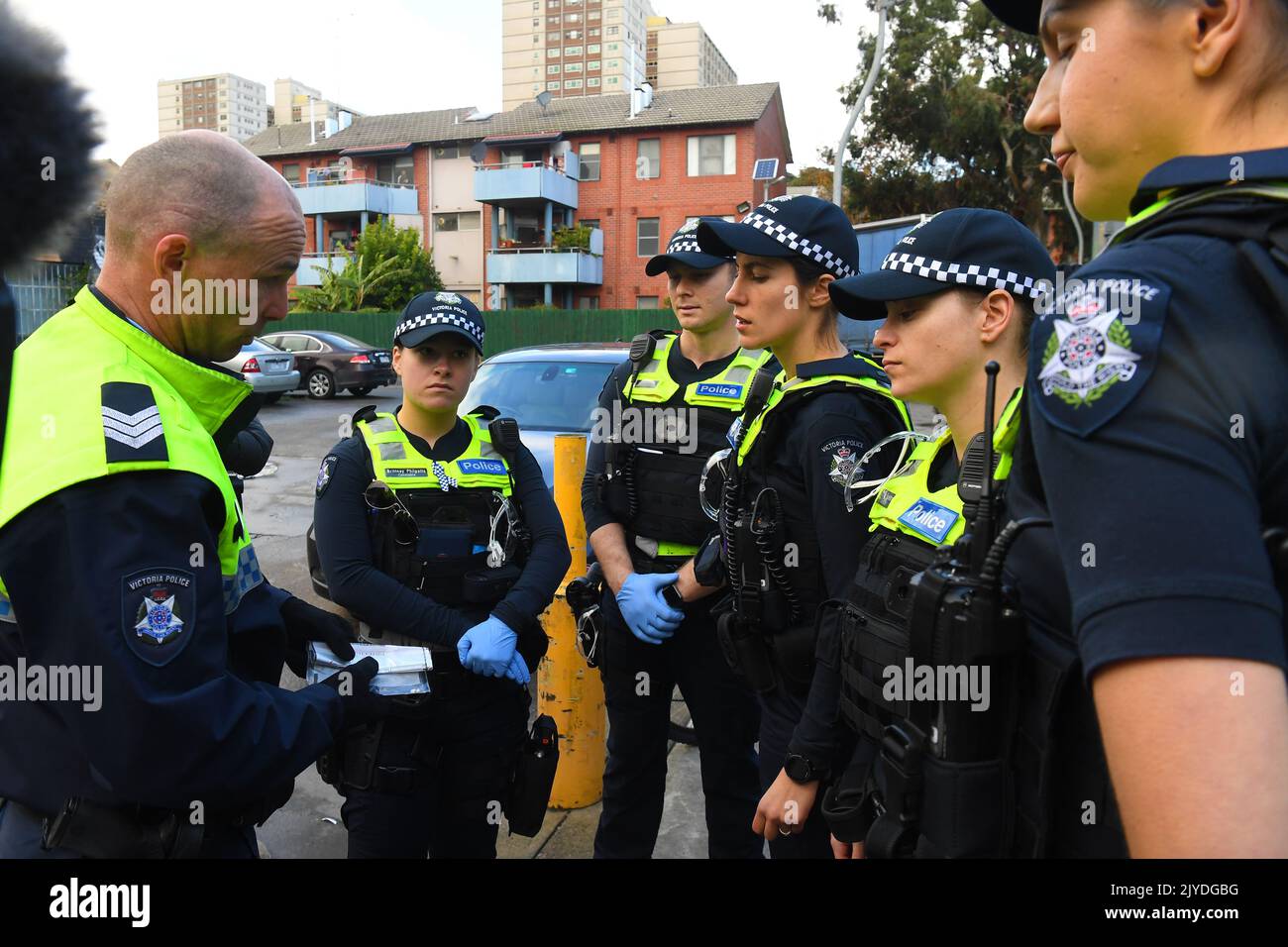 Victoria Police officers examine drugs during a patrol near Victoria ...