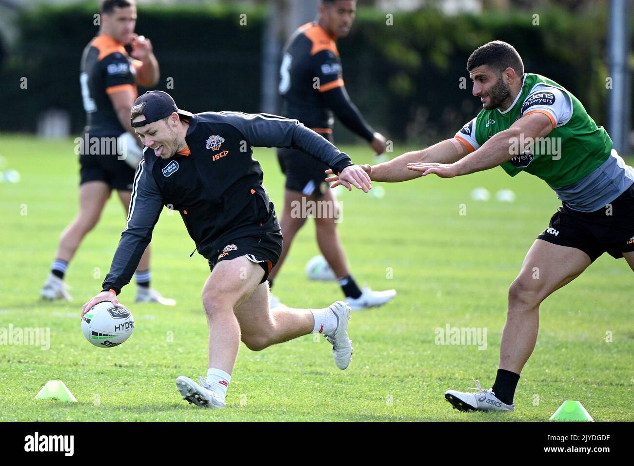 Billy Walters (left) and Alex Twal of the Wests Tigers take part in a ...