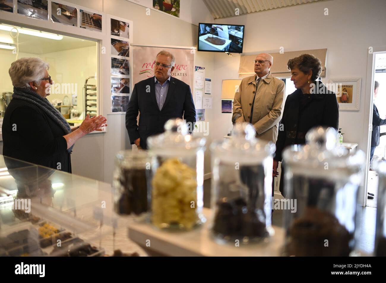 Australian Prime Minister Scott Morrison speaks to business owner Robyn ...