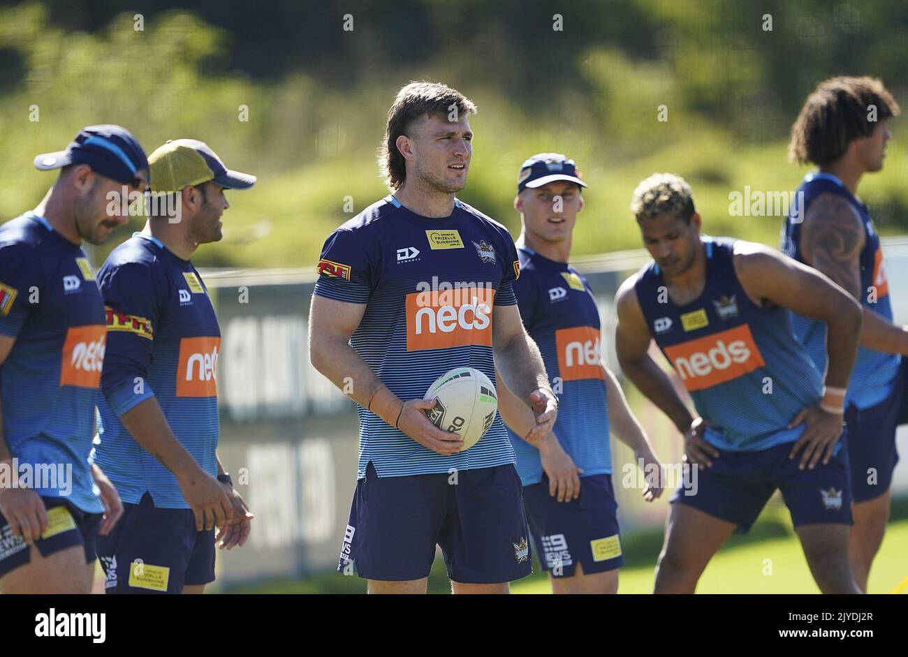 Jai Arrow (centre) looks on during an NRL Titans training session at ...