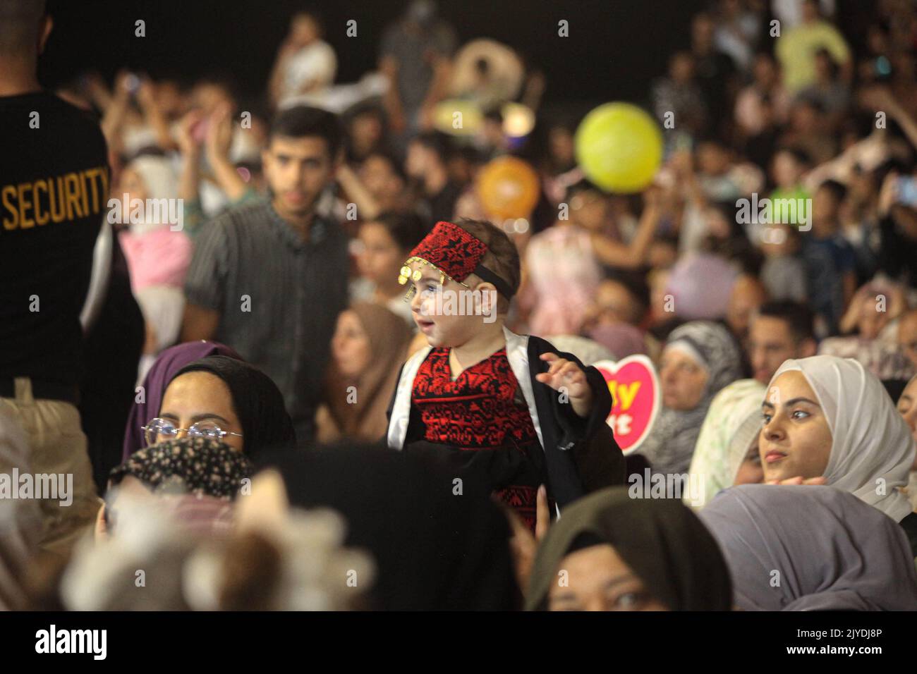 Palestinian students attend their graduation ceremony at Al-Quds Open ...