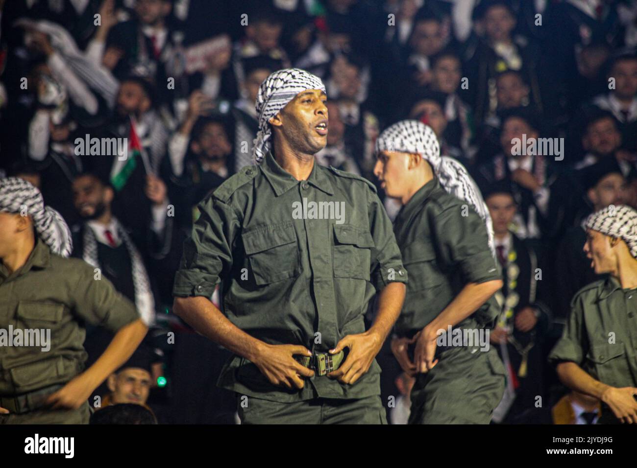 Palestinian students attend their graduation ceremony at Al-Quds Open ...
