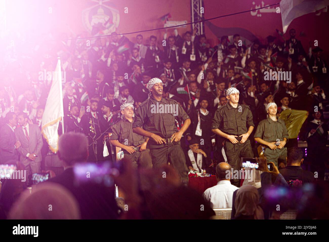 Palestinian students attend their graduation ceremony at Al-Quds Open ...