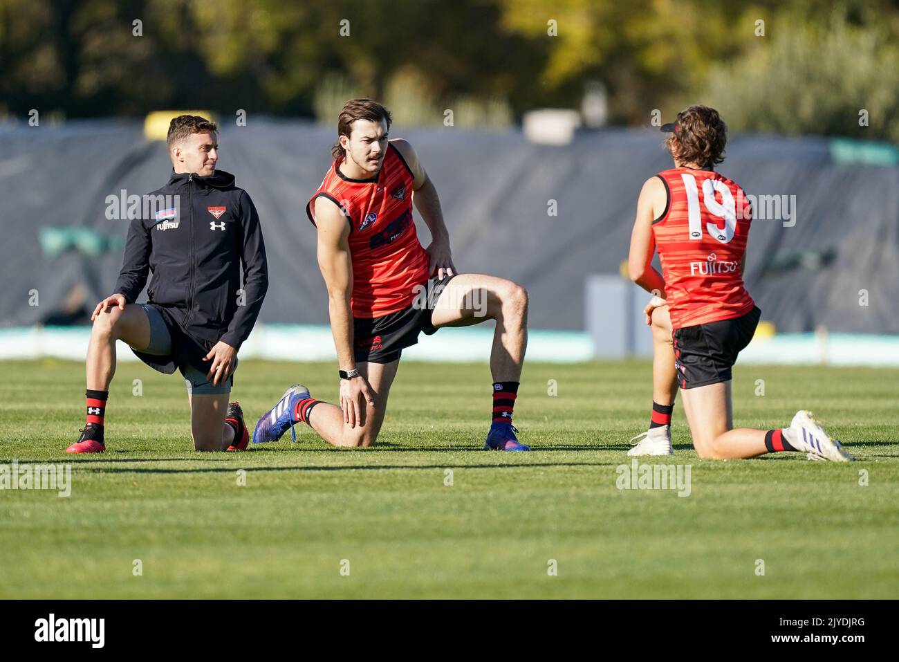Sam Draper warms up during an AFL Bombers training session at The ...