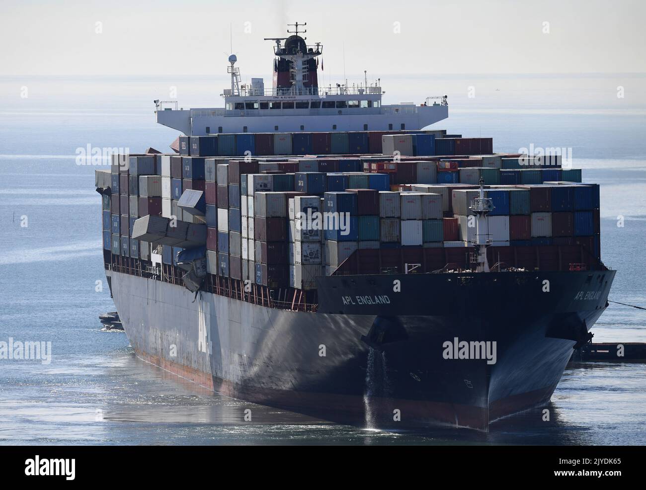 Fallen shipping containers can be seen on the Singapore-flagged ...